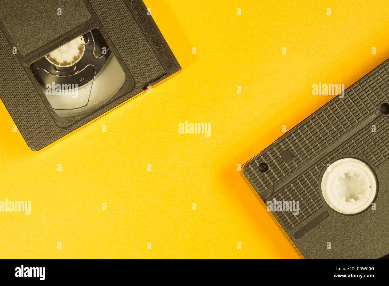 VHS video tape cassette isolated on yellow background Stock Photo - Alamy
