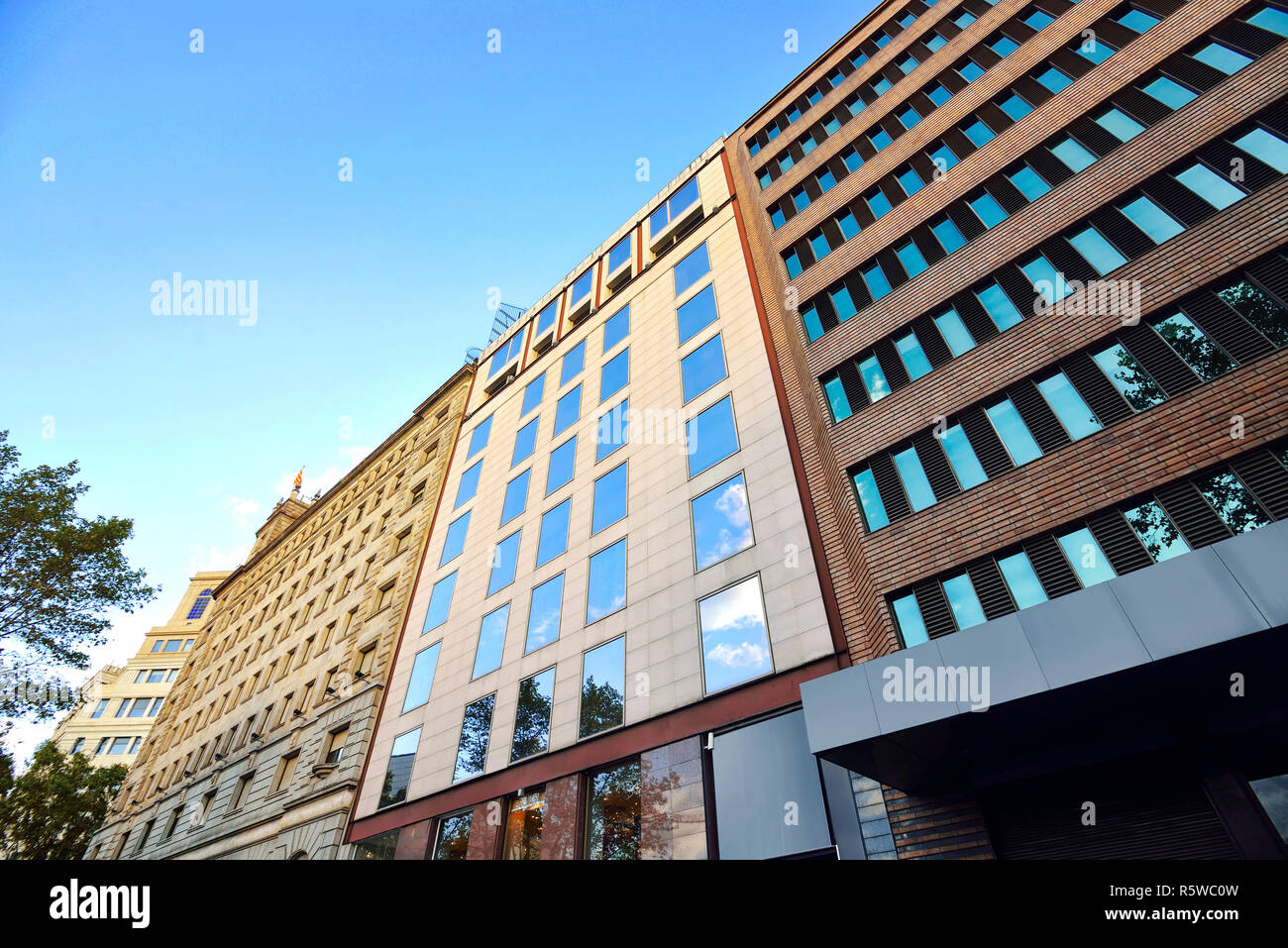Modern town building exterior with windows glass Stock Photo - Alamy