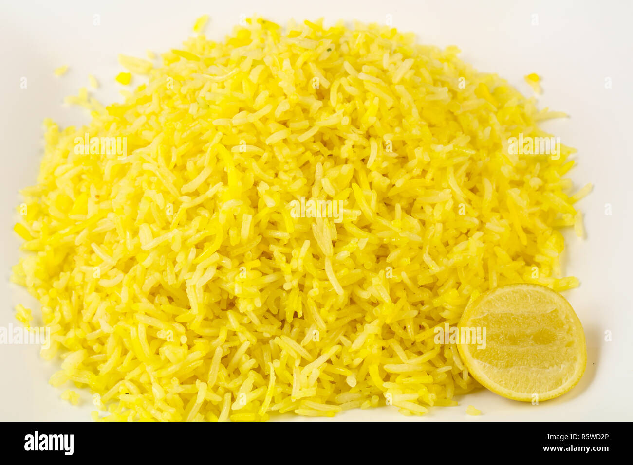 Indian traditional cuisine - Yellow Rice with Lime Stock Photo - Alamy