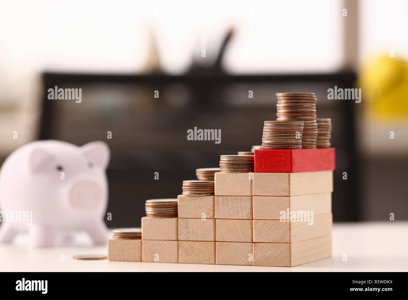 Hand businessman putting pin money Stock Photo - Alamy