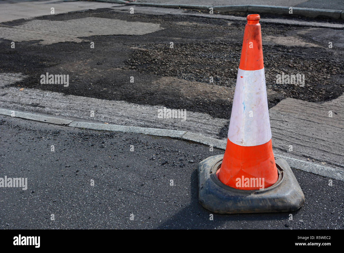 Traffic Cone On Broken High Resolution Stock Photography and Images - Alamy