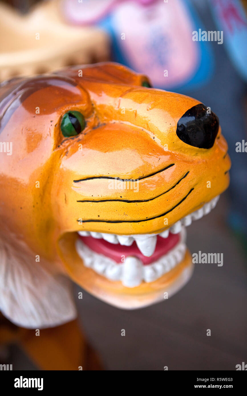 Plastic tiger on a carousel Stock Photo - Alamy