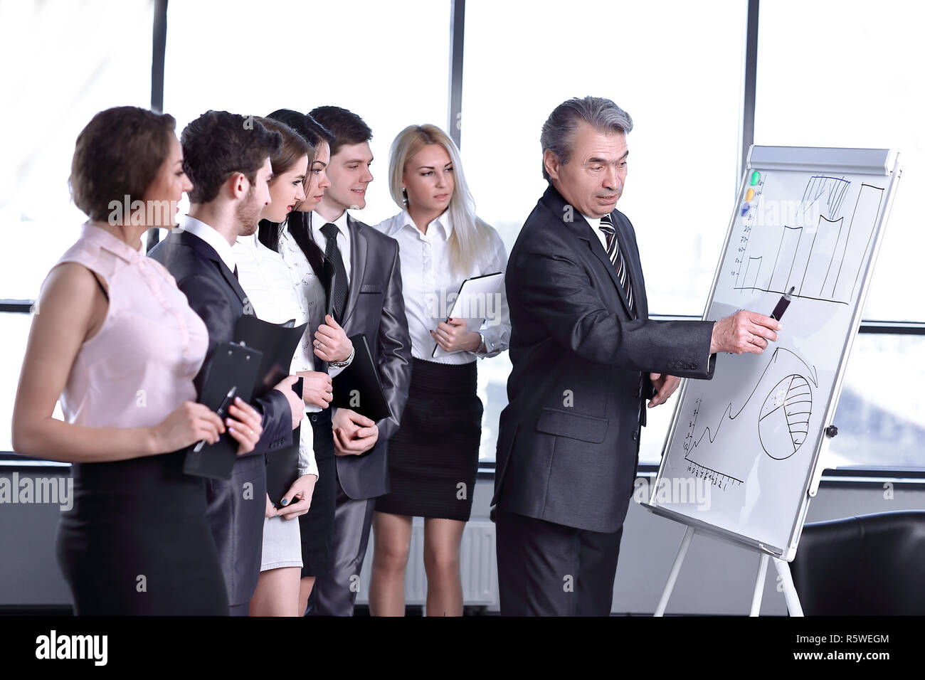 Presentation charts businessman board hi-res stock photography and ...