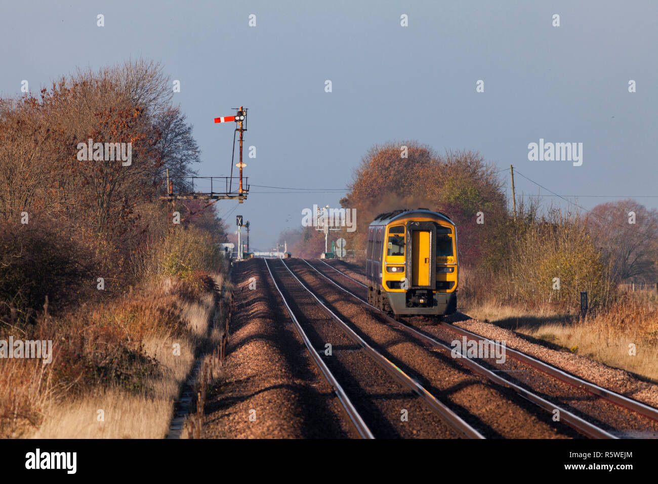 Arriva rail Northern class 158 sprinter train passing the semaphore ...