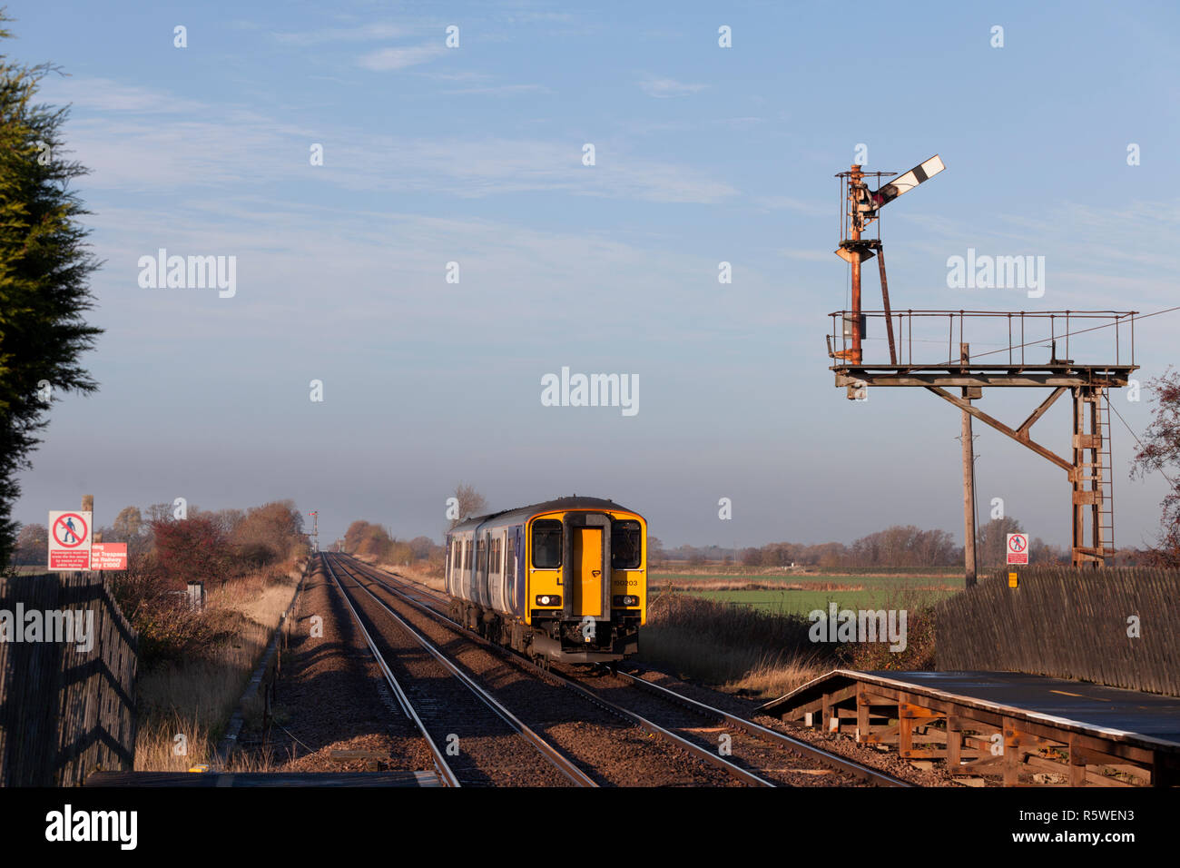Arriva rail Northern class 150 sprinter train passing the semaphore ...