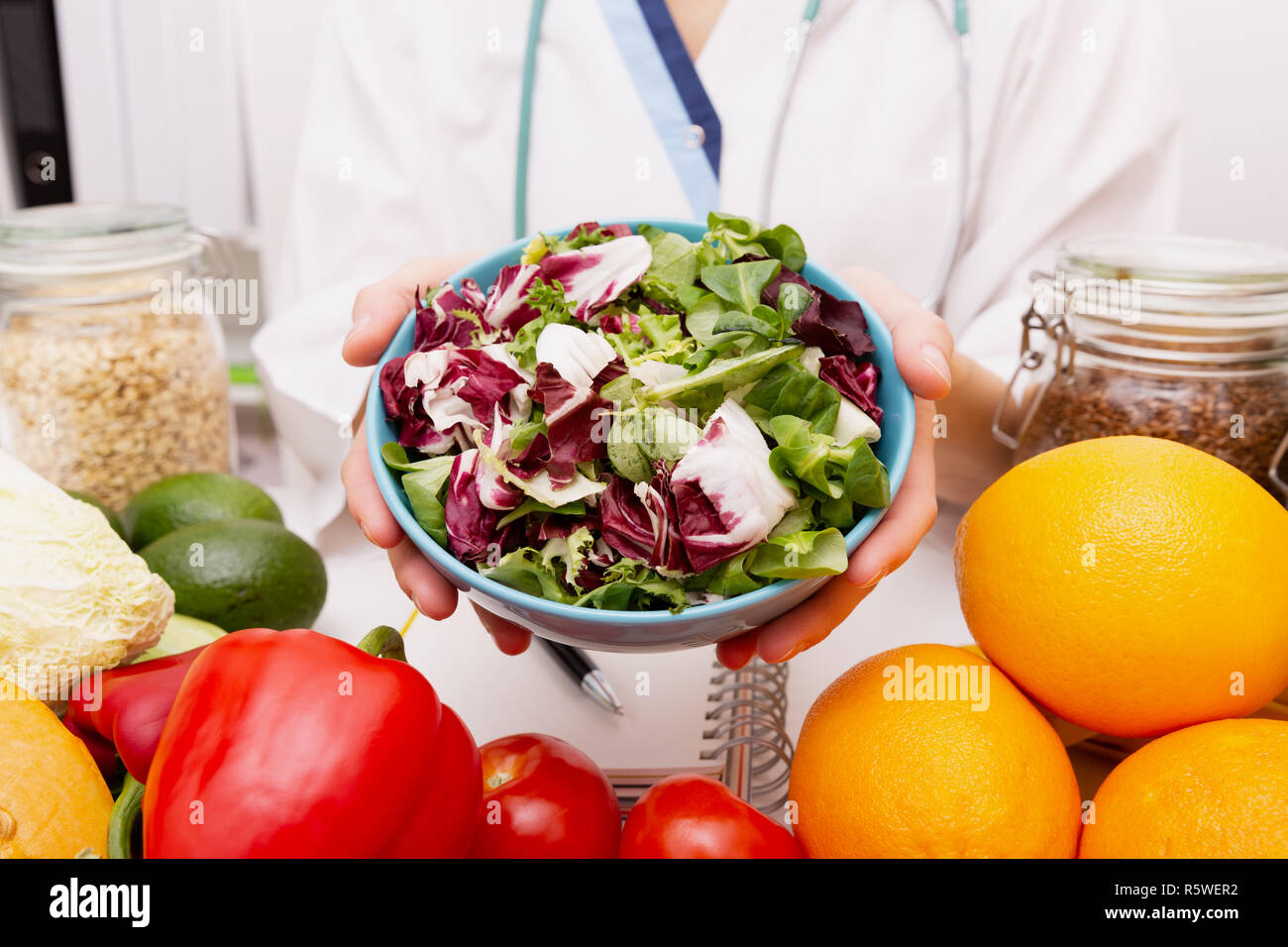 Vegetable diet nutrition and medication concept. Nutritionist offers ...