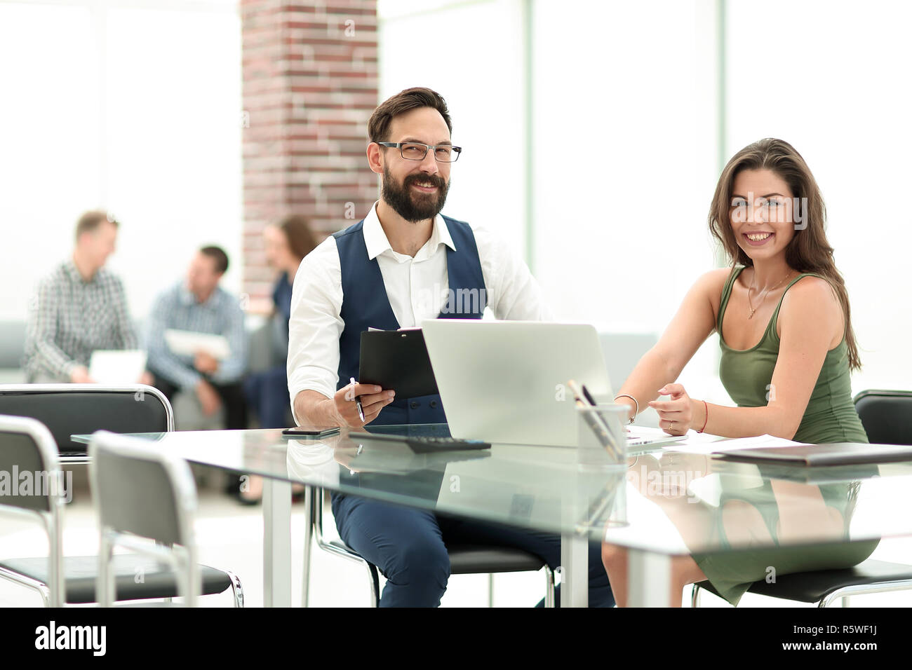 Team colleagues working desk Cut Out Stock Images & Pictures - Alamy