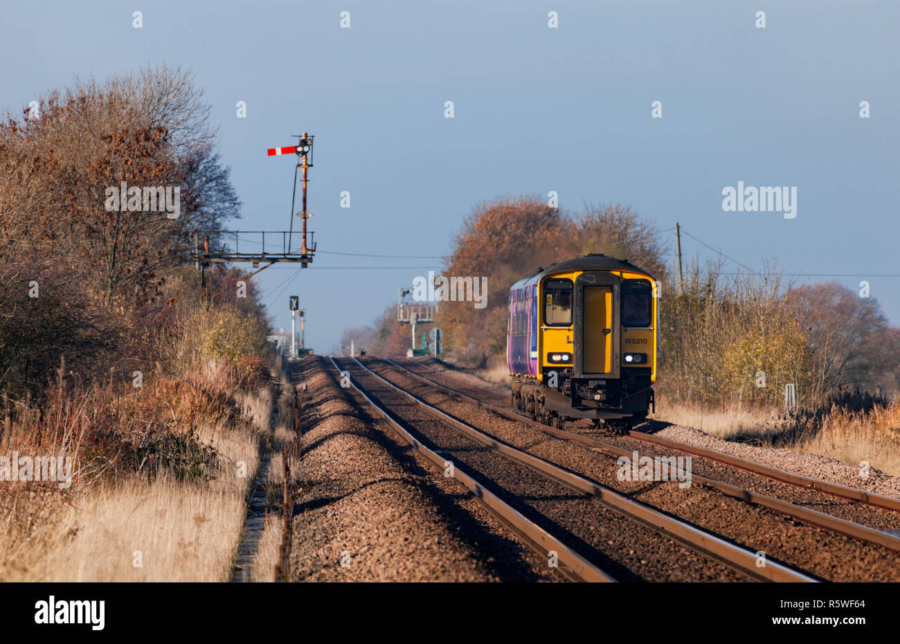 Arriva rail Northern class 150 sprinter train passing the semaphore ...