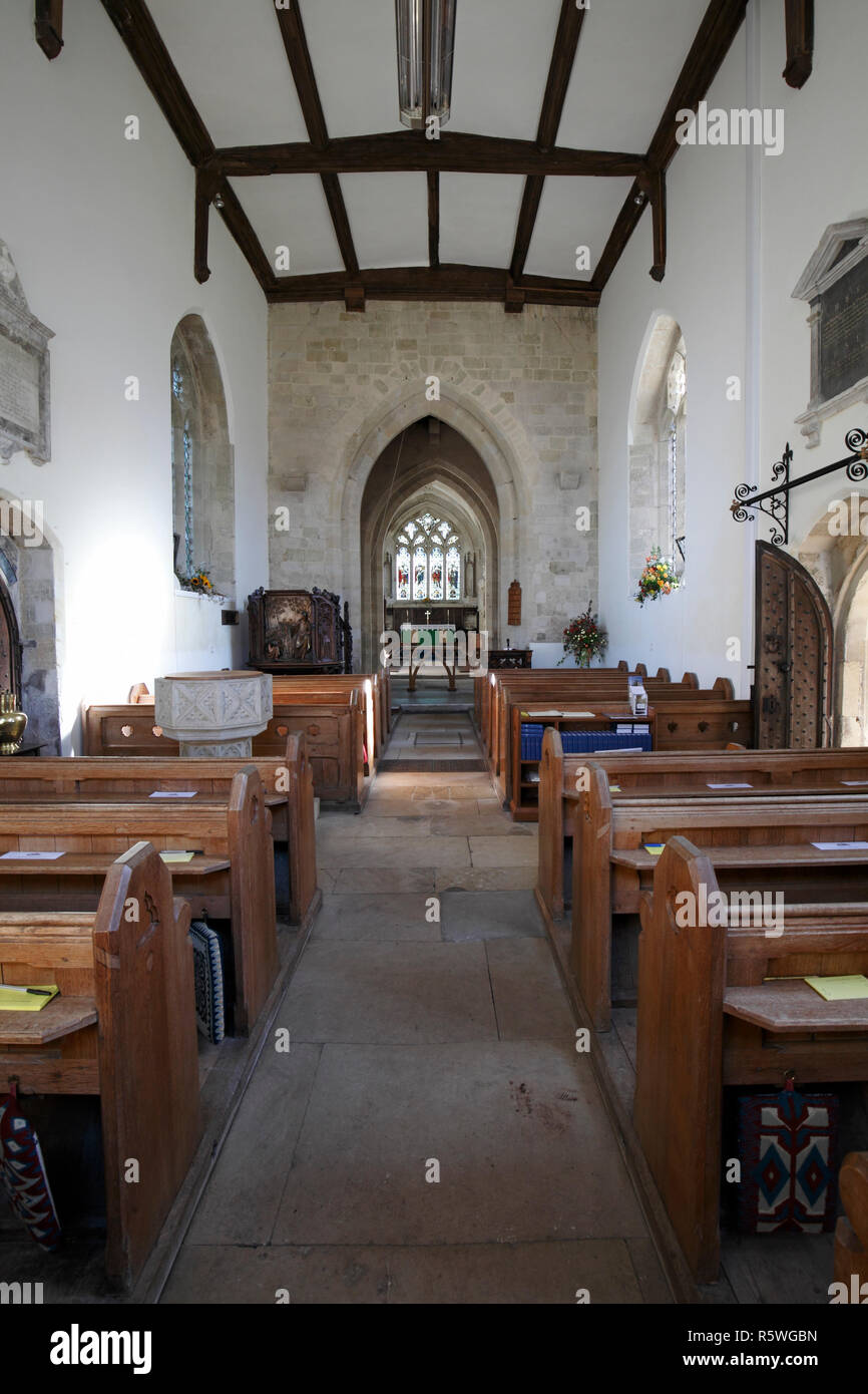 Oak pews, carved font, Bishopstone Church, Wiltshire Stock Photo - Alamy