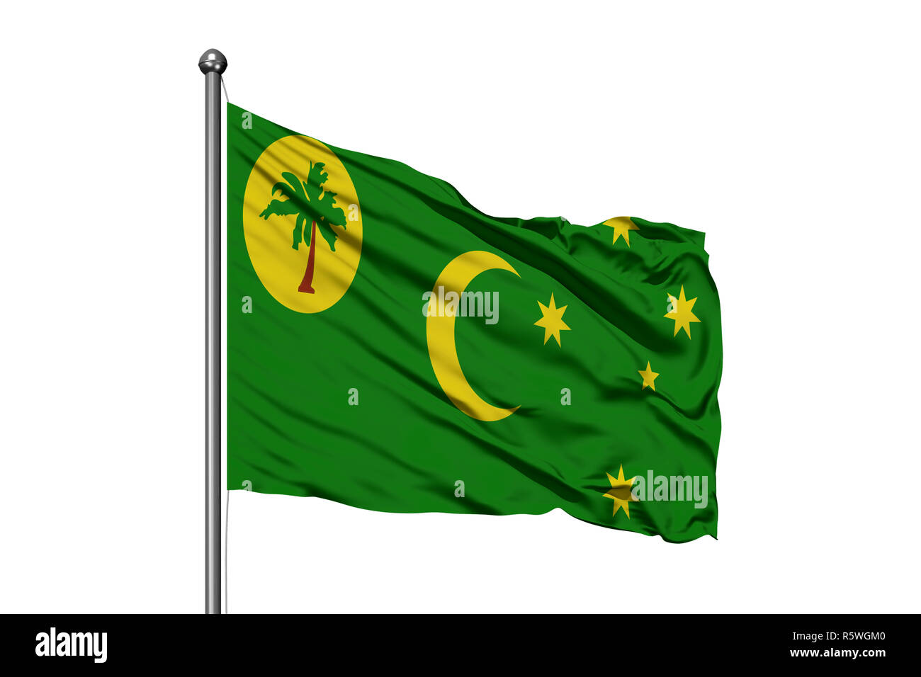 Flag of Cocos Islands waving in the wind against deep blue sky. Keeling ...