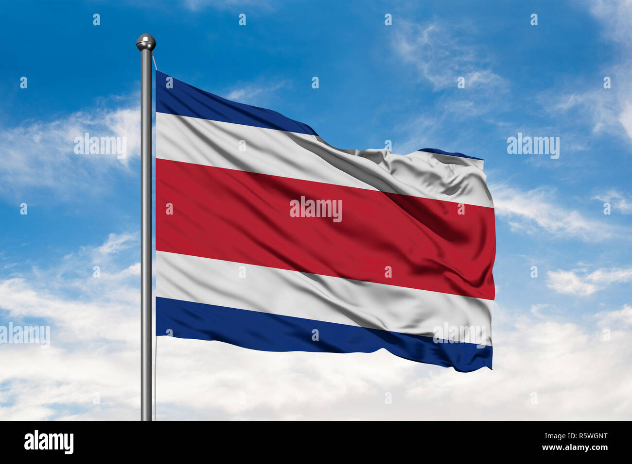 Flag of Costa Rica waving in the wind against white cloudy blue sky ...