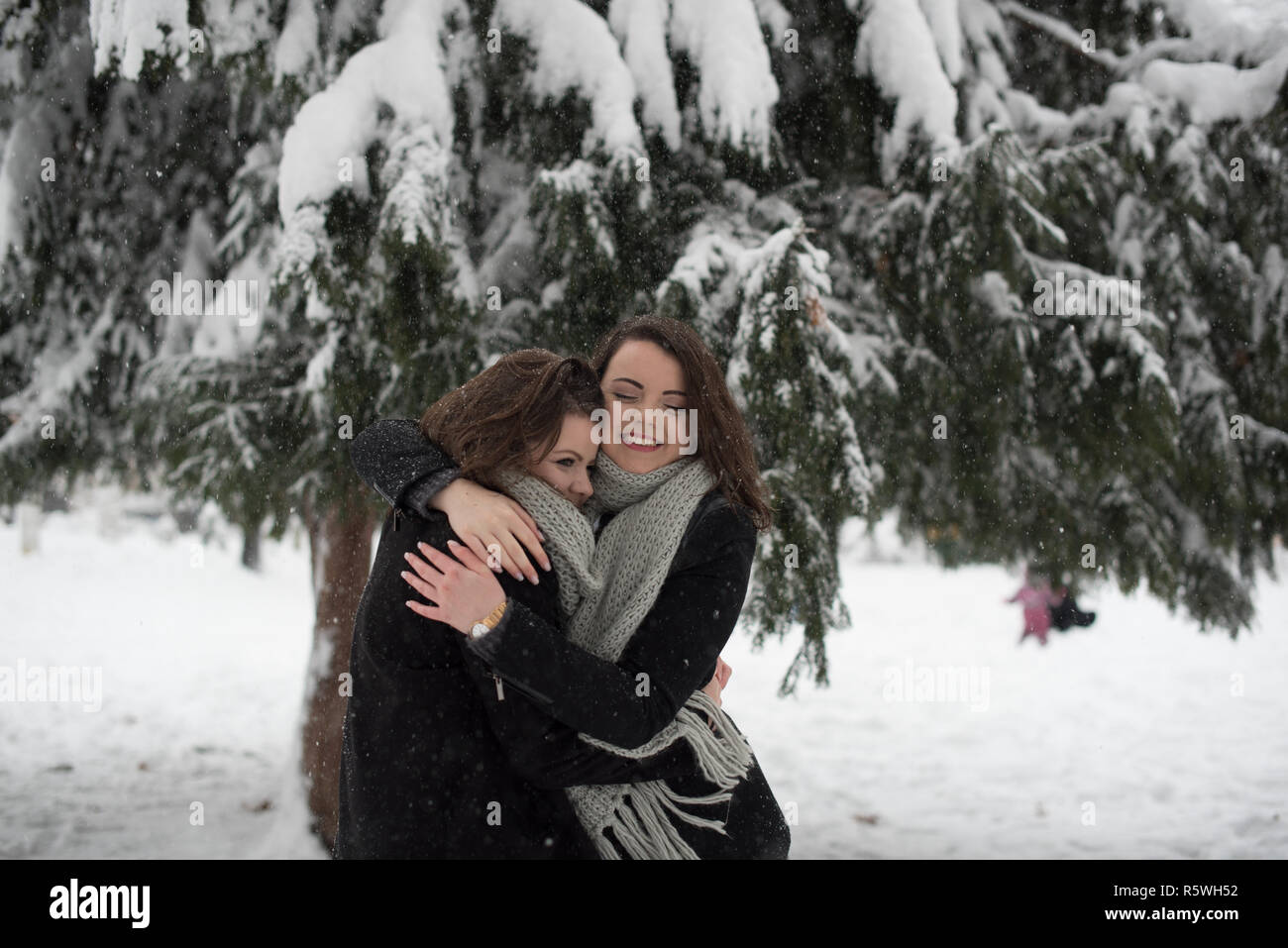 Two people hugging hi-res stock photography and images - Alamy