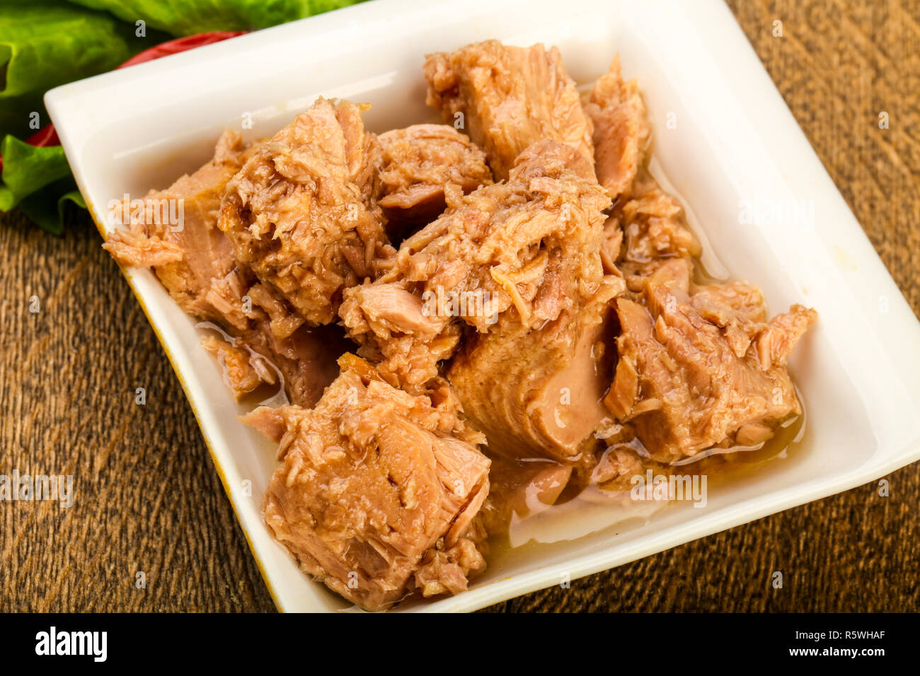 Canned tuna fish in the bowl ready for cooking Stock Photo - Alamy