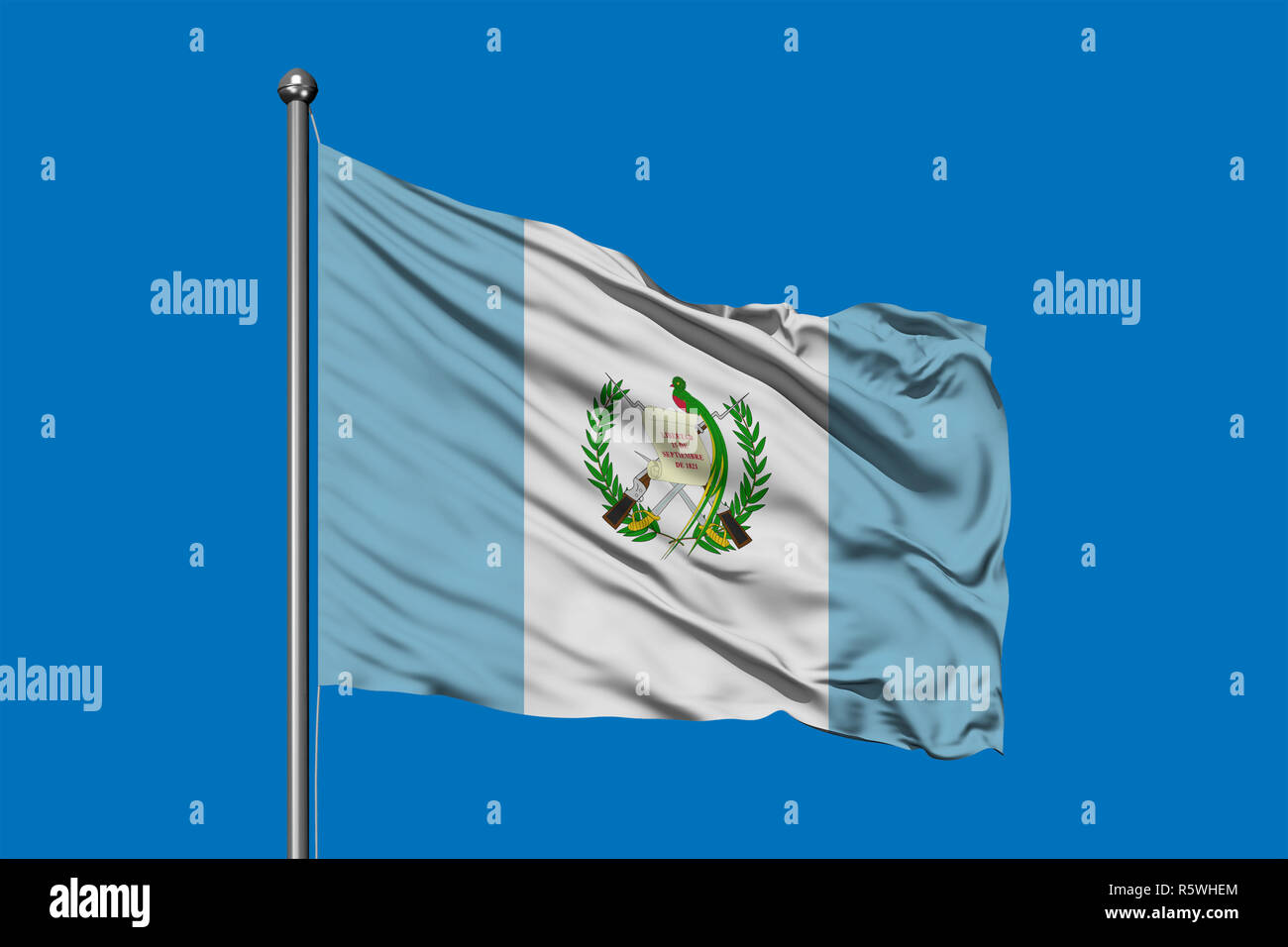 Flag of Guatemala waving in the wind against deep blue sky. Guatemalan ...
