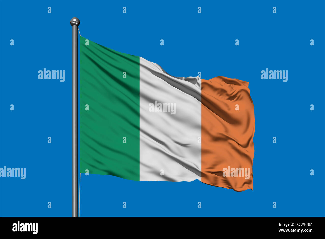 Flag of Ireland waving in the wind against deep blue sky. Irish flag ...