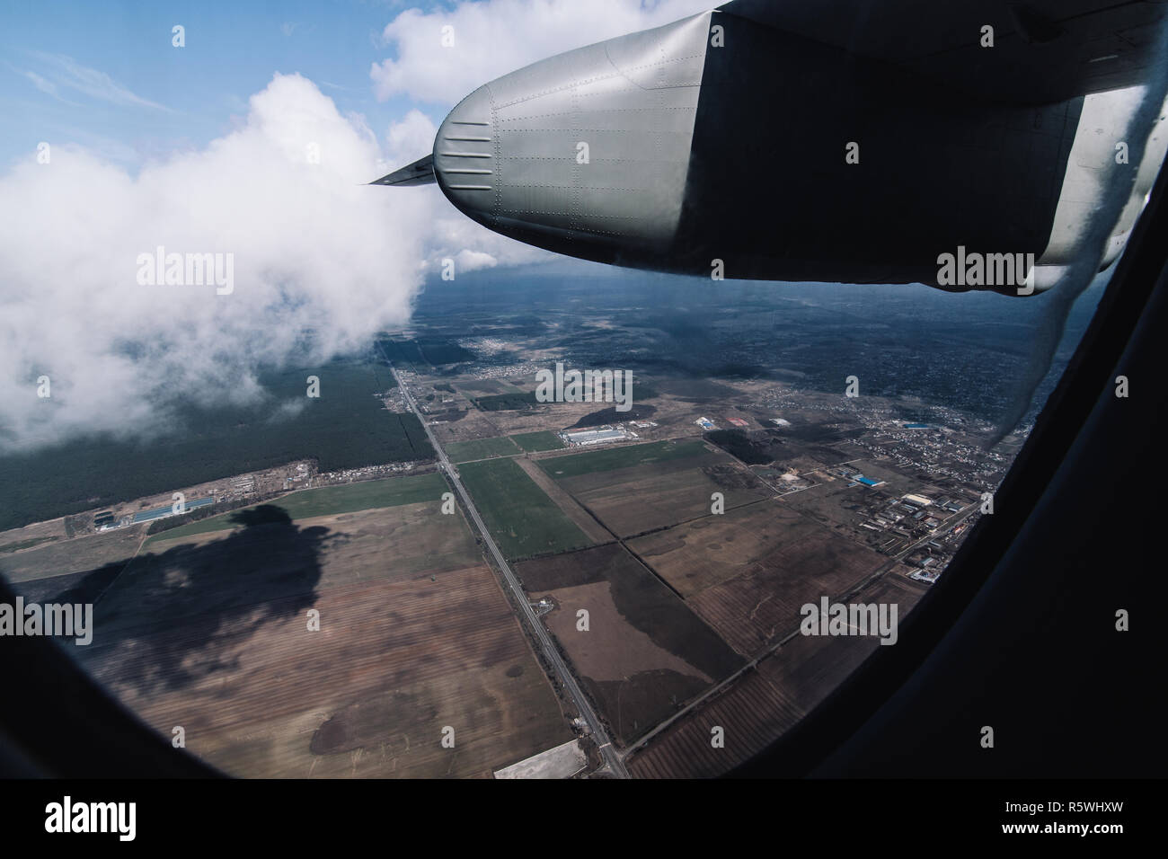 Turboprop engine view from illuminator with aerial bright background ...