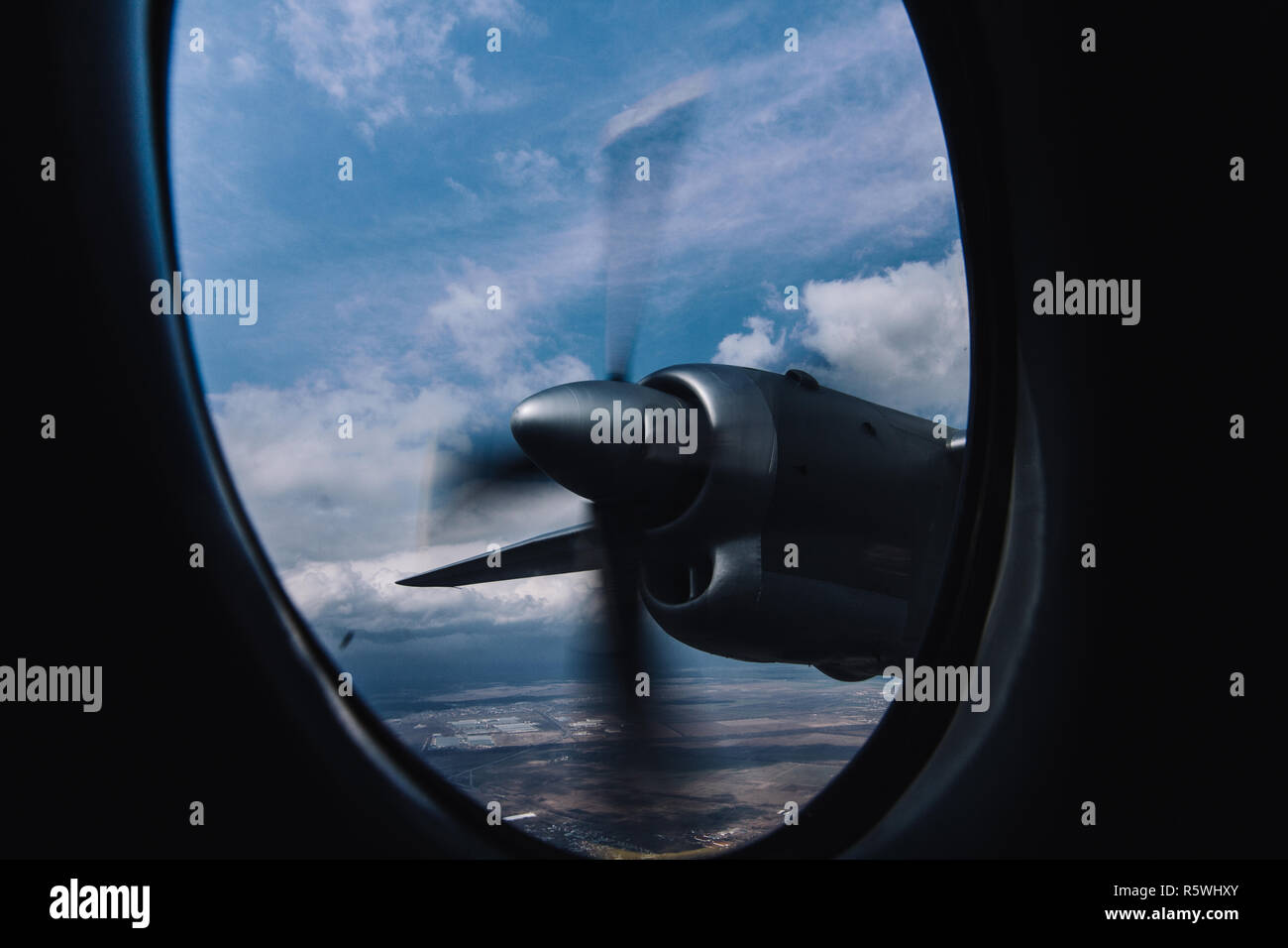Turboprop engine view from illuminator with aerial bright background ...