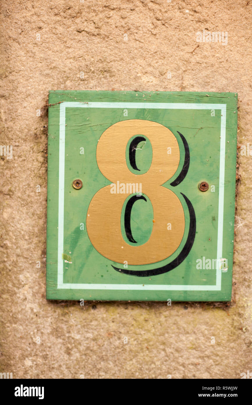 Wooden sign no 8 on white background. Wood old planks Stock Photo - Alamy