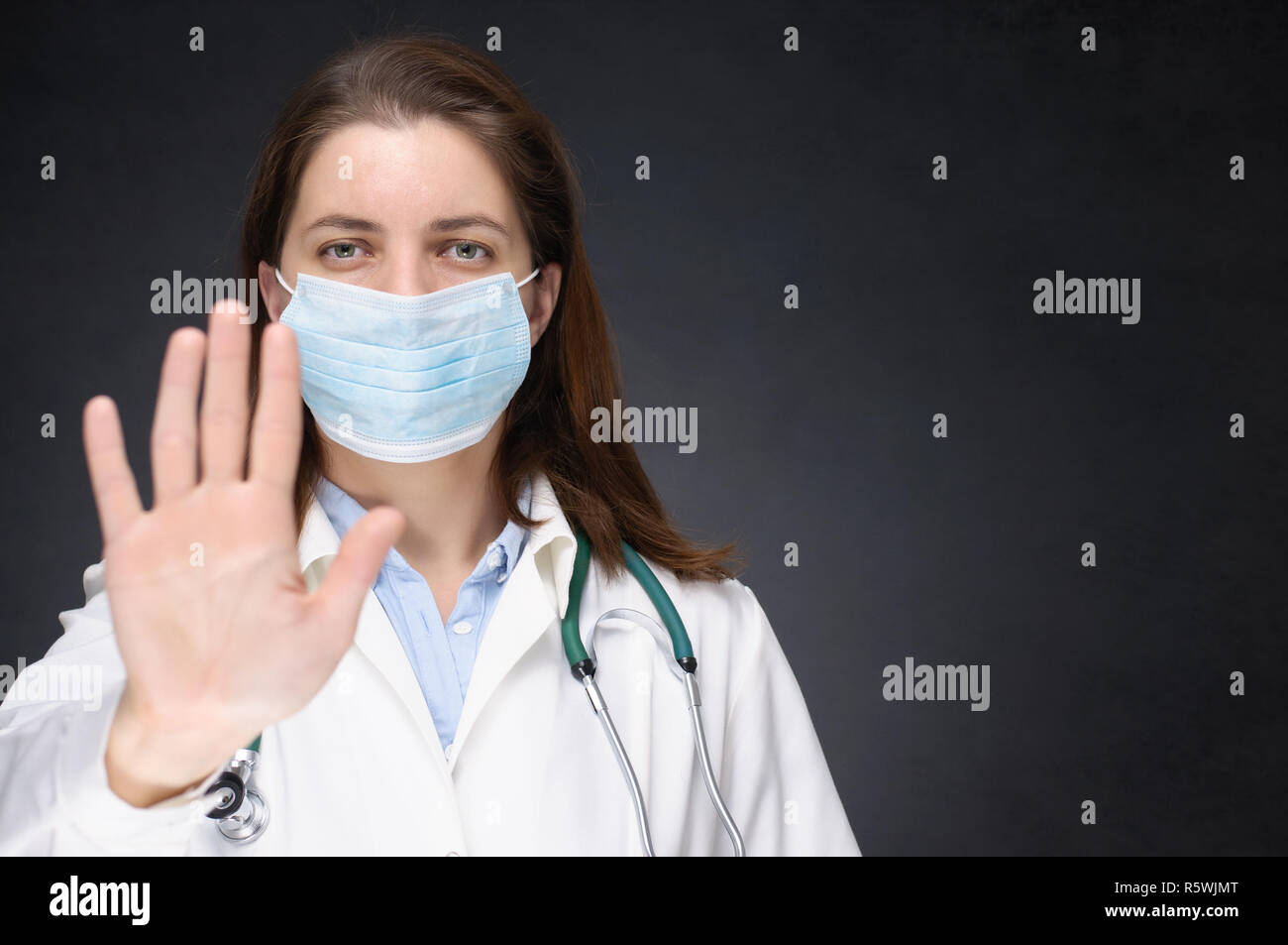 Doctor showing stop sign Stock Photo - Alamy