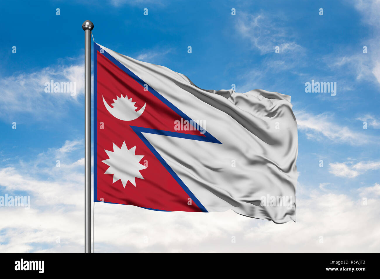 Flag of Nepal waving in the wind against white cloudy blue sky ...