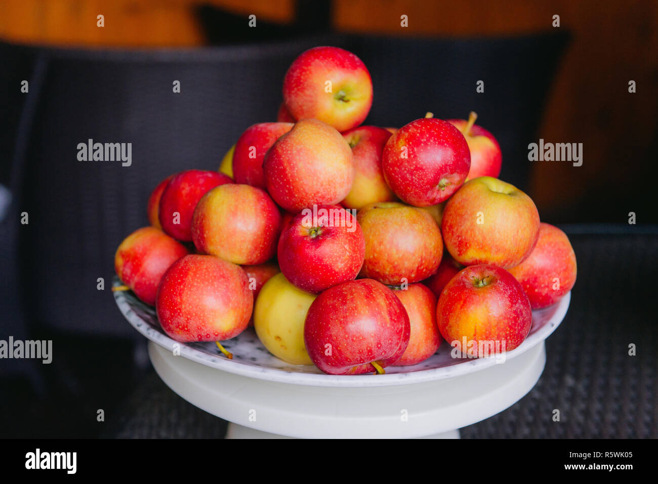 Stack of apples on a dish Stock Photo - Alamy