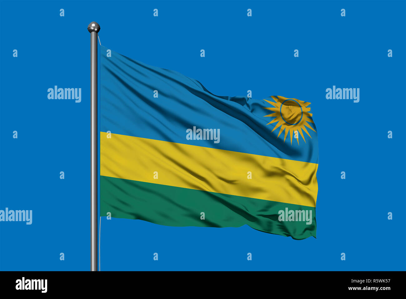 Flag of Rwanda waving in the wind against deep blue sky. Rwandan flag ...