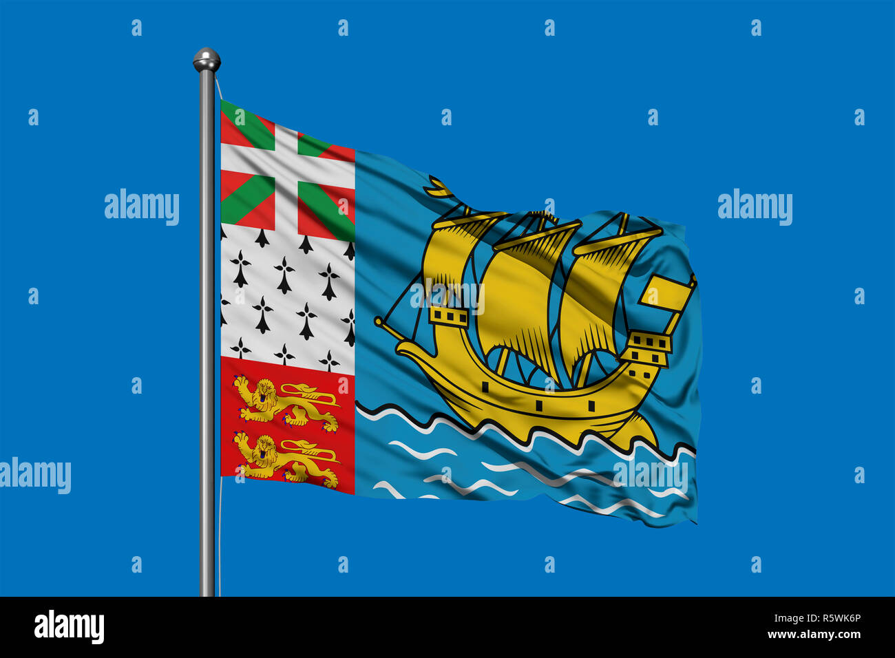 Flag of Saint Pierre and Miquelon waving in the wind against deep blue ...