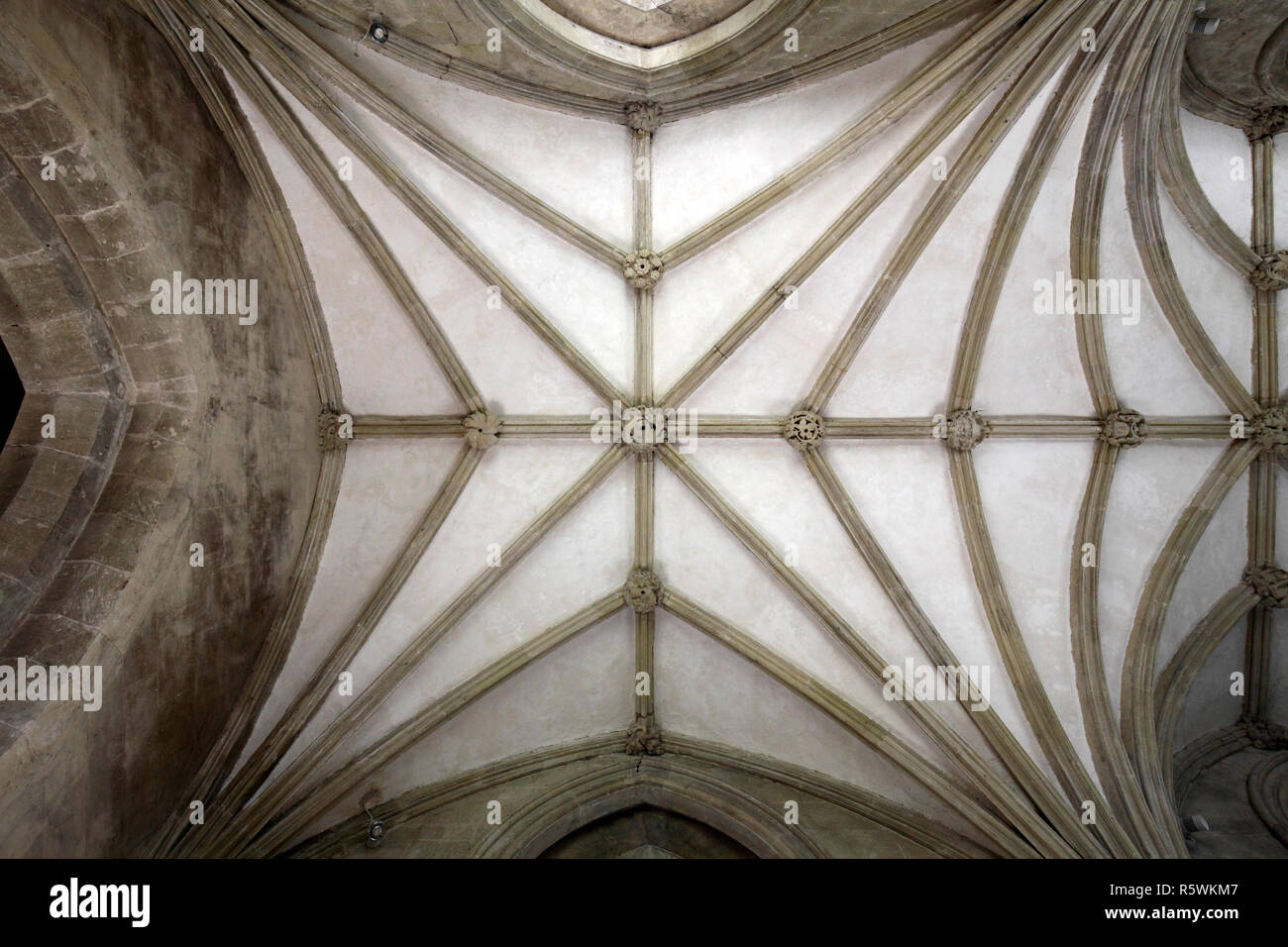 Stone church roof bracers and bosses. Stone vaulting ribs. St John the ...