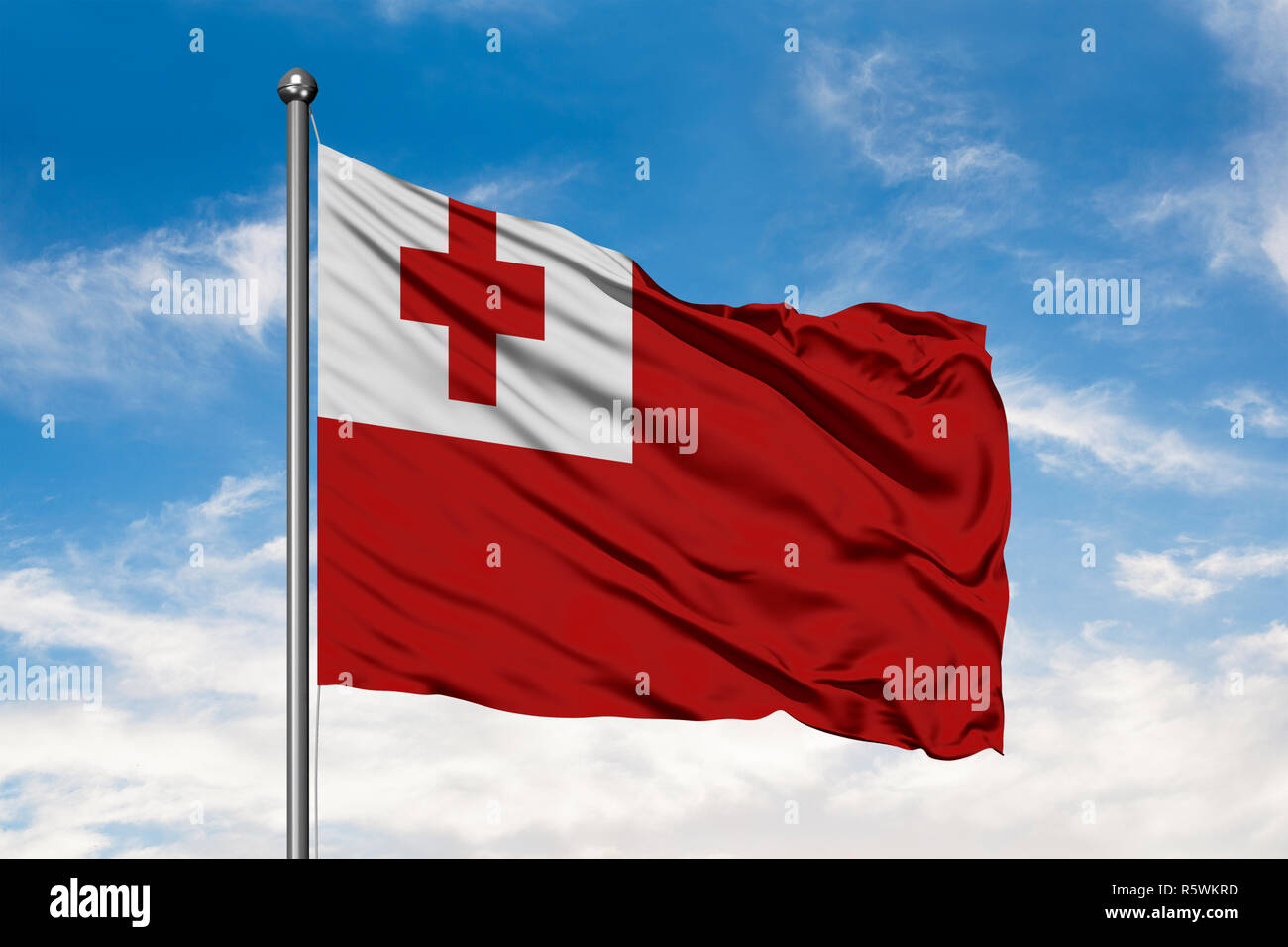 Flag of Tonga waving in the wind against white cloudy blue sky Stock ...