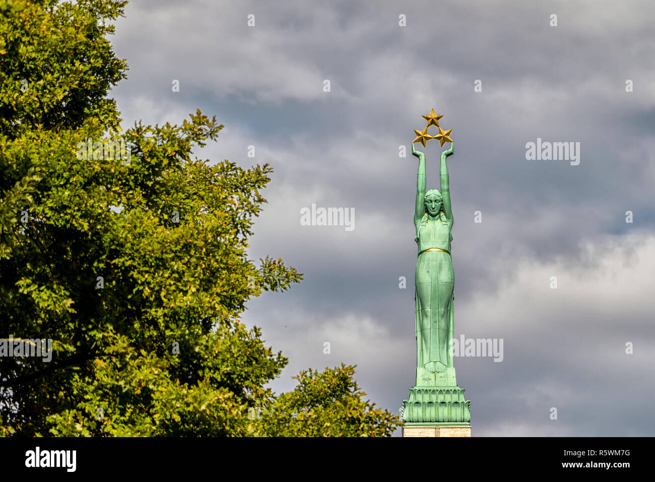 The freedom monument in old town Riga, Latvia Stock Photo - Alamy