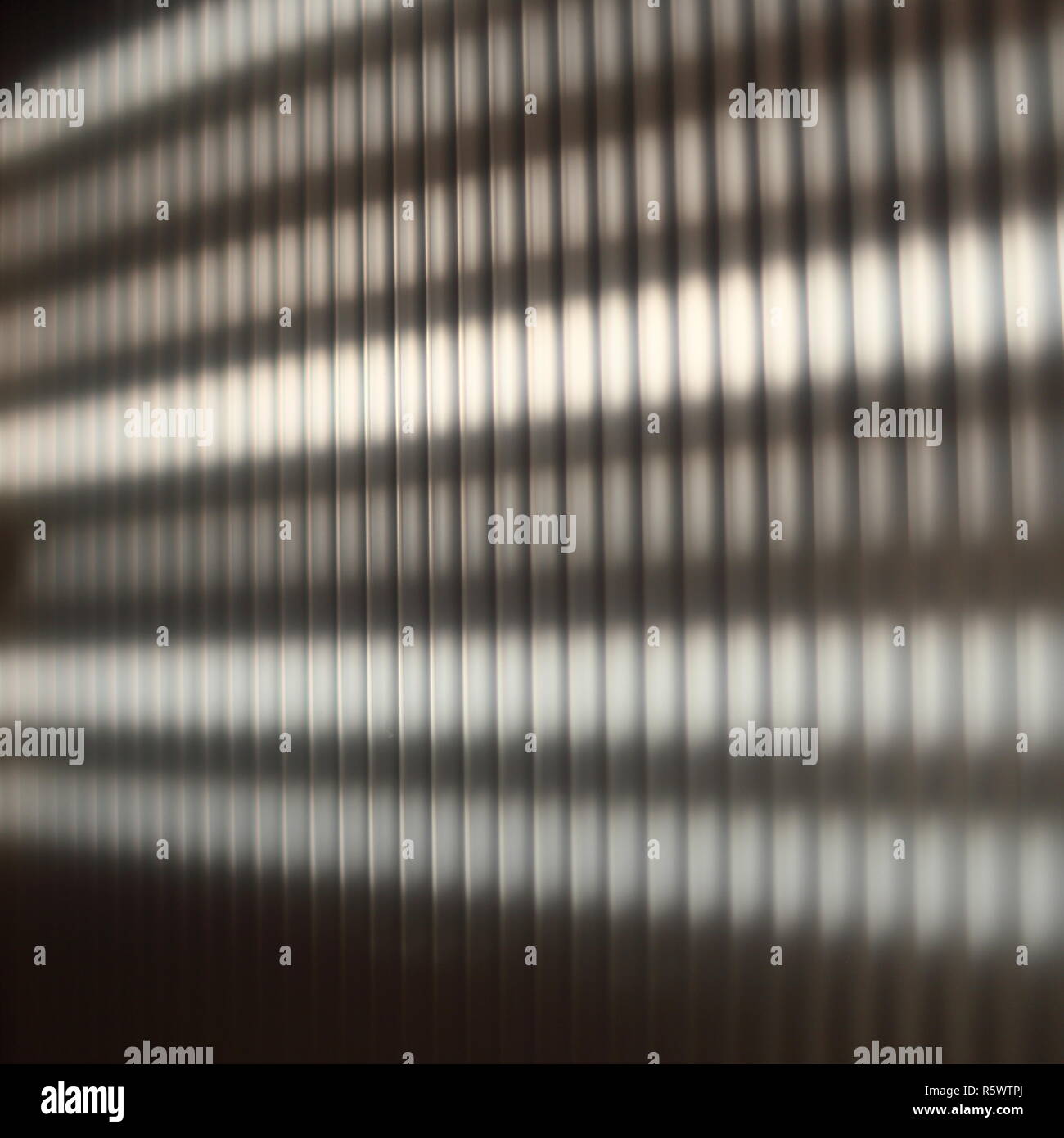 horizontal shafts of light and shadows on an opaque screen Stock Photo ...