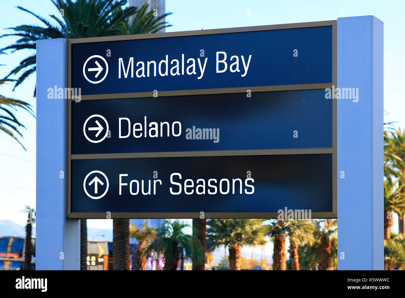 Street sign poiting to the Mandalay Bay, Delano and Four Seasons hotels ...