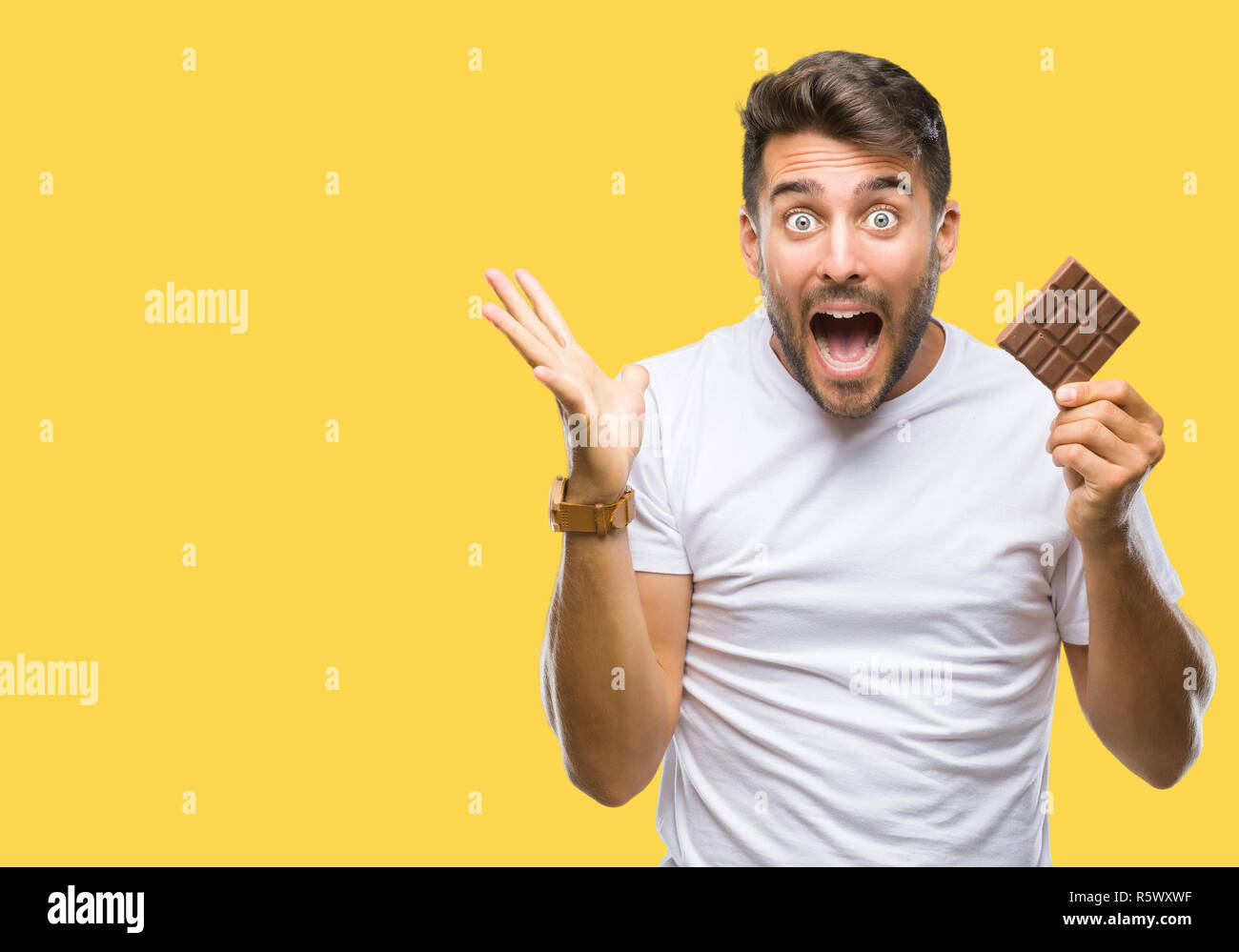 Guy eating chocolate bar and happy hi-res stock photography and images ...