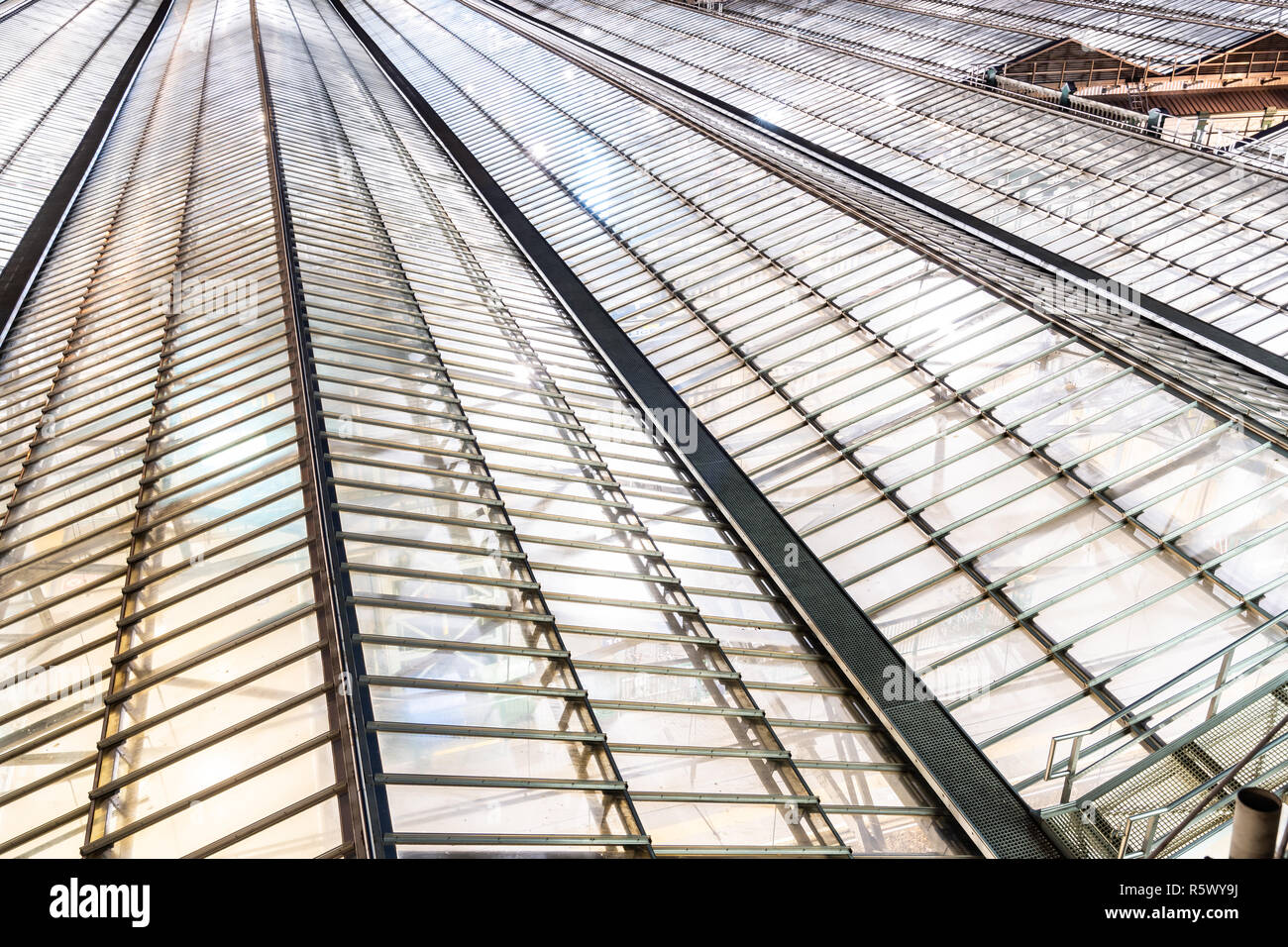 Illumination of glass roof of train station Stock Photo - Alamy