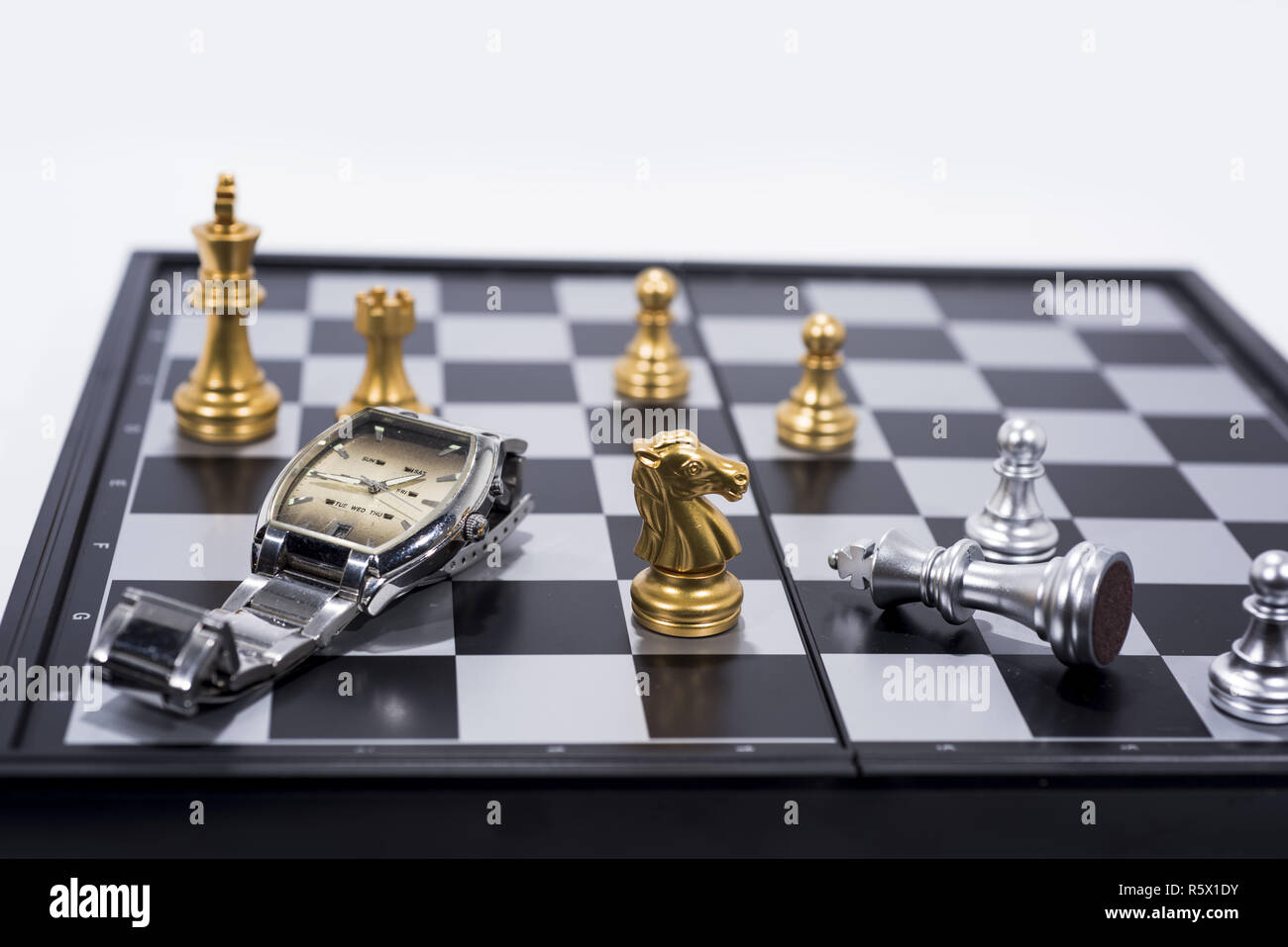 Chess Board isolated on white background. Golden and silver figures ...