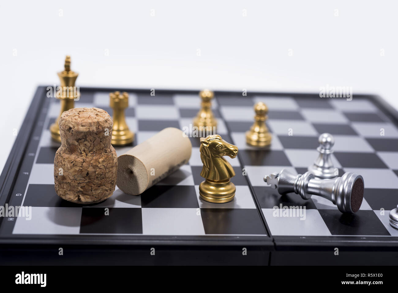 Chess Board isolated on white background. Golden and silver figures ...