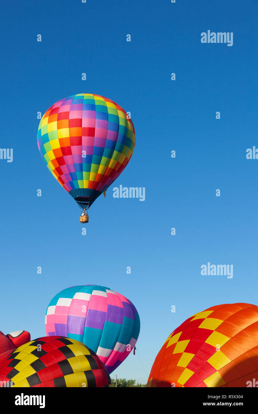 Hot air balloons lifting off Stock Photo - Alamy