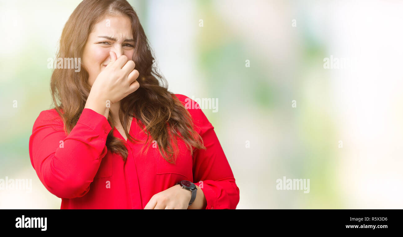 Beautiful plus size young business woman over isolated background ...