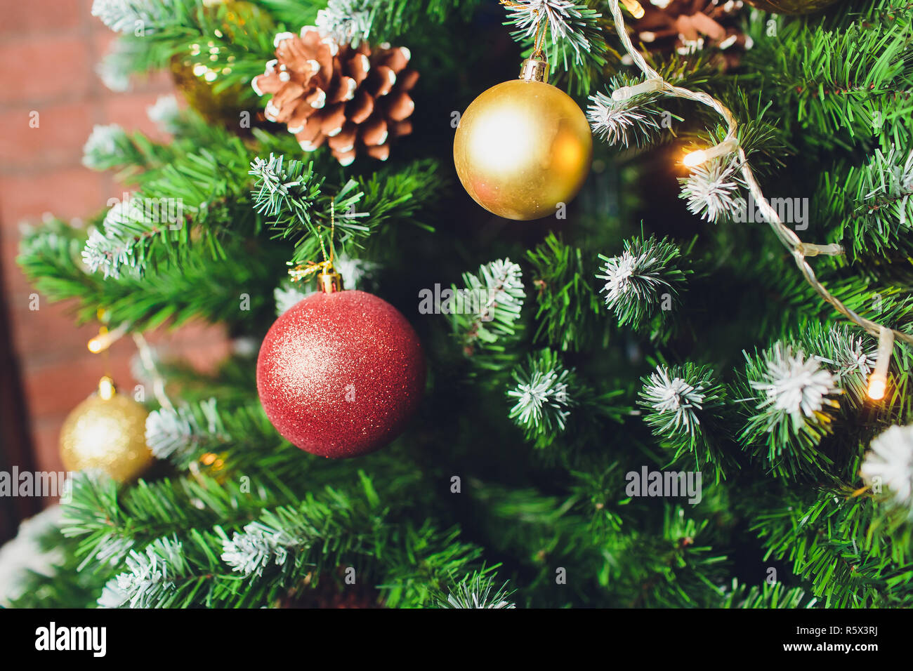Christmas background - baubles and branch of spruce tree Stock Photo ...