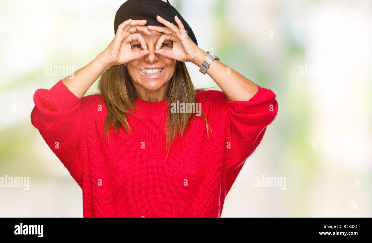 Middle age adult woman wearing fashion beret over isolated background ...