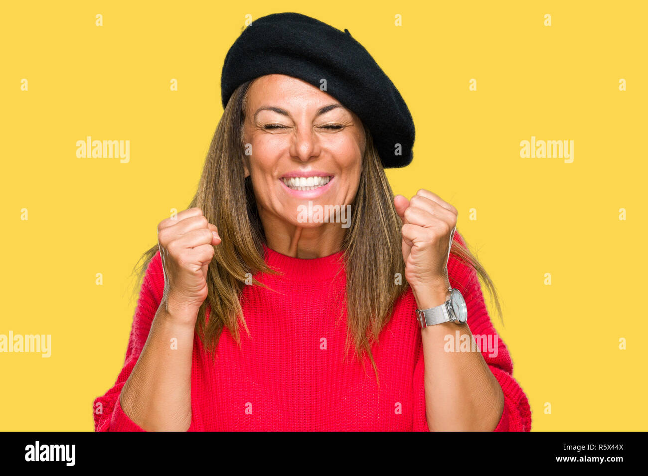 Middle age adult woman wearing fashion beret over isolated background ...