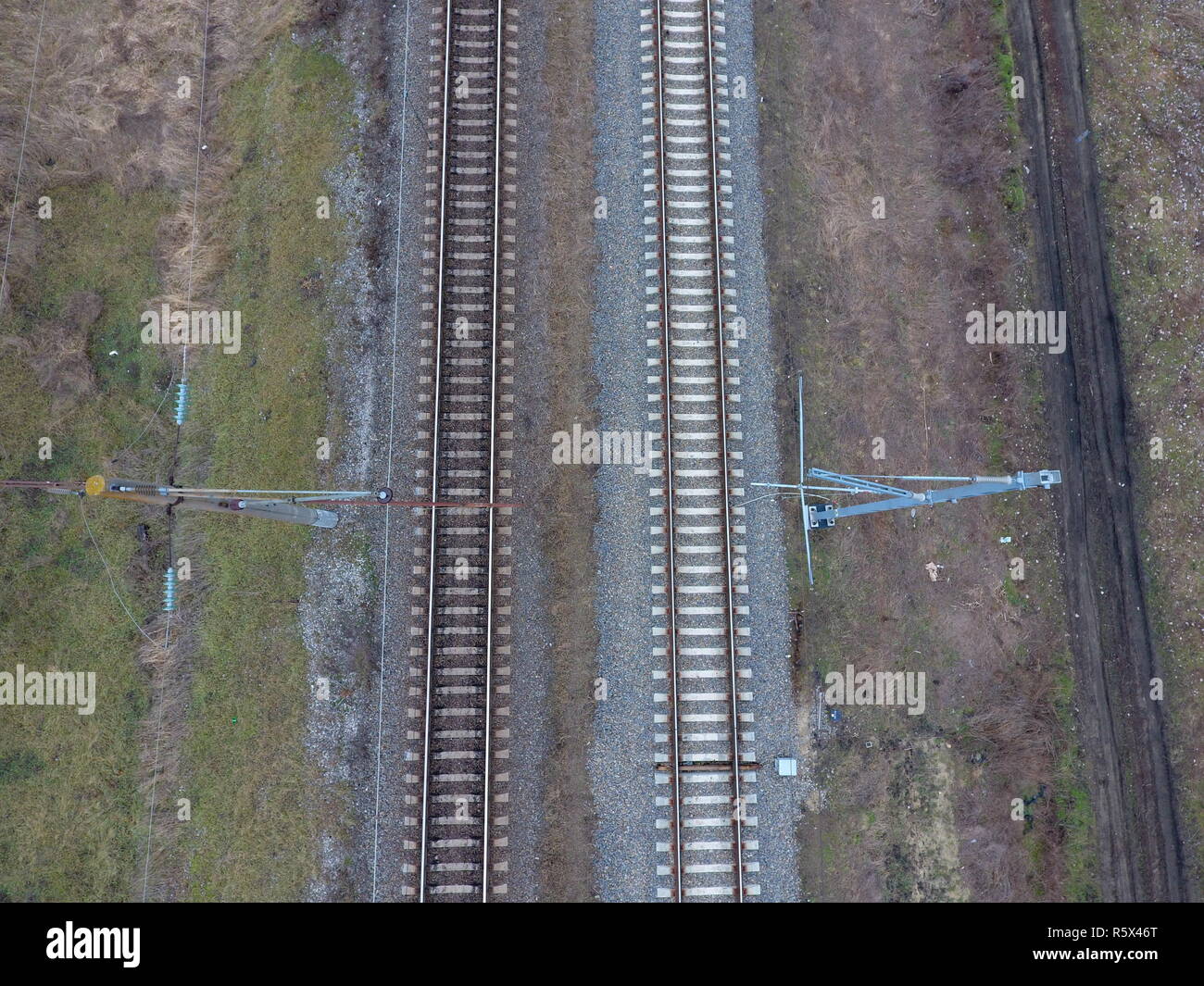 Plot railway. Top view on the rails. High-voltage power lines for ...