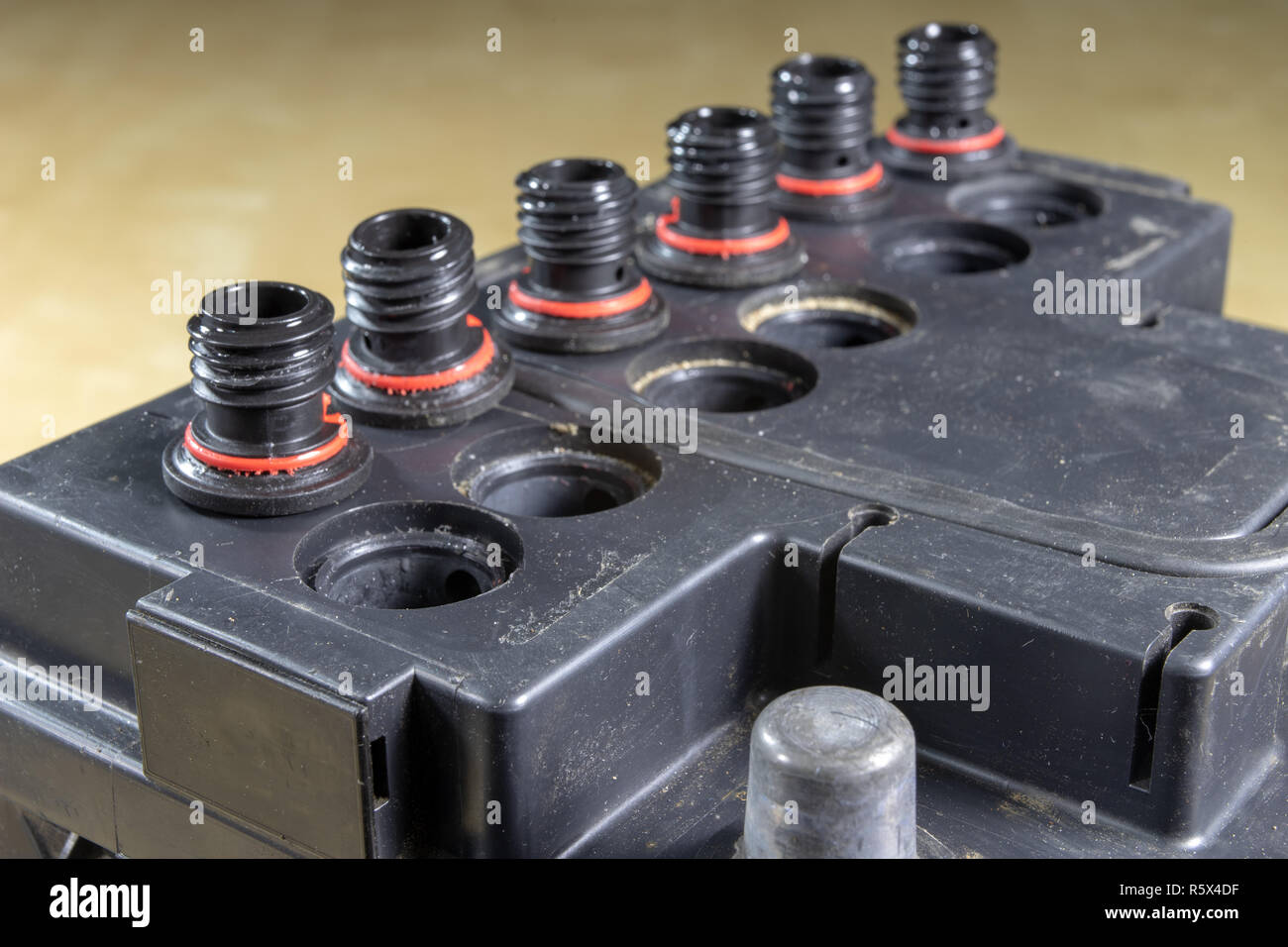 Charging and operating the car battery. Car accessories in the workshop ...