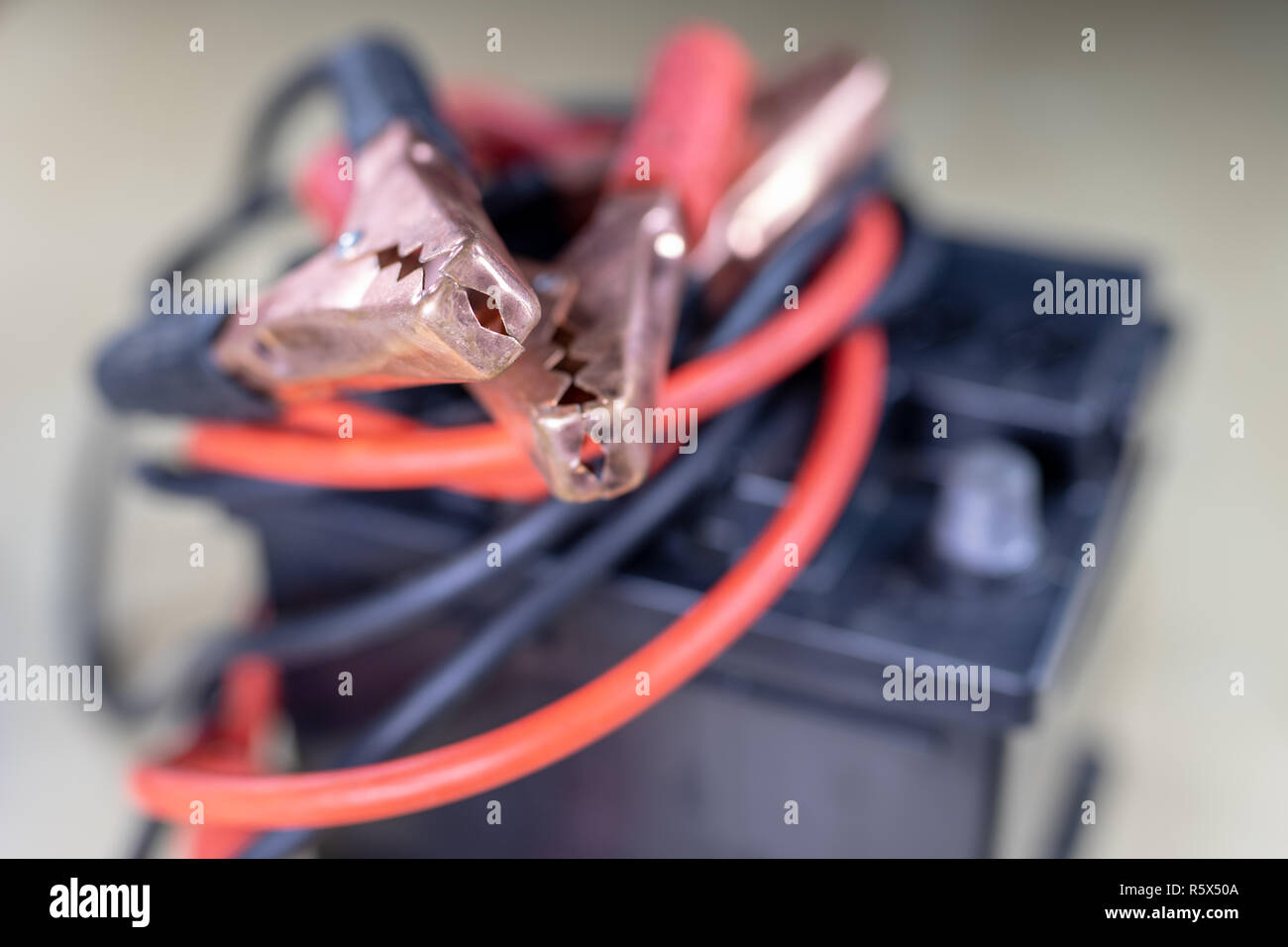 Charging and operating the car battery. Car accessories in the workshop ...