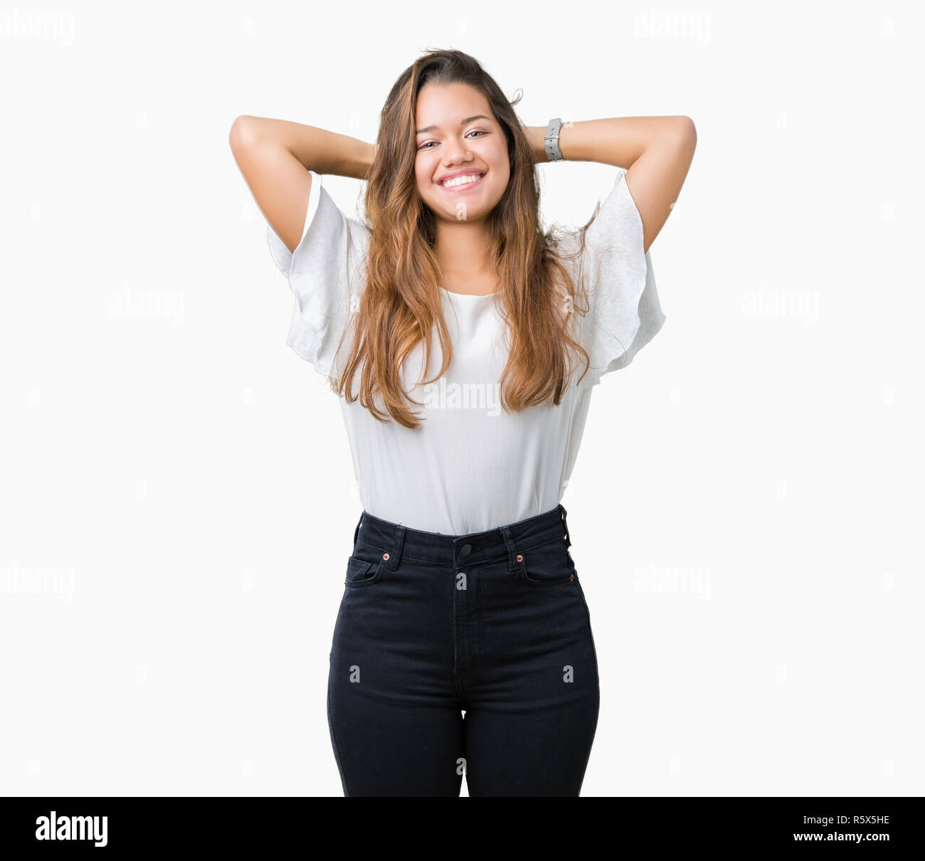 Young beautiful brunette business woman over isolated background ...