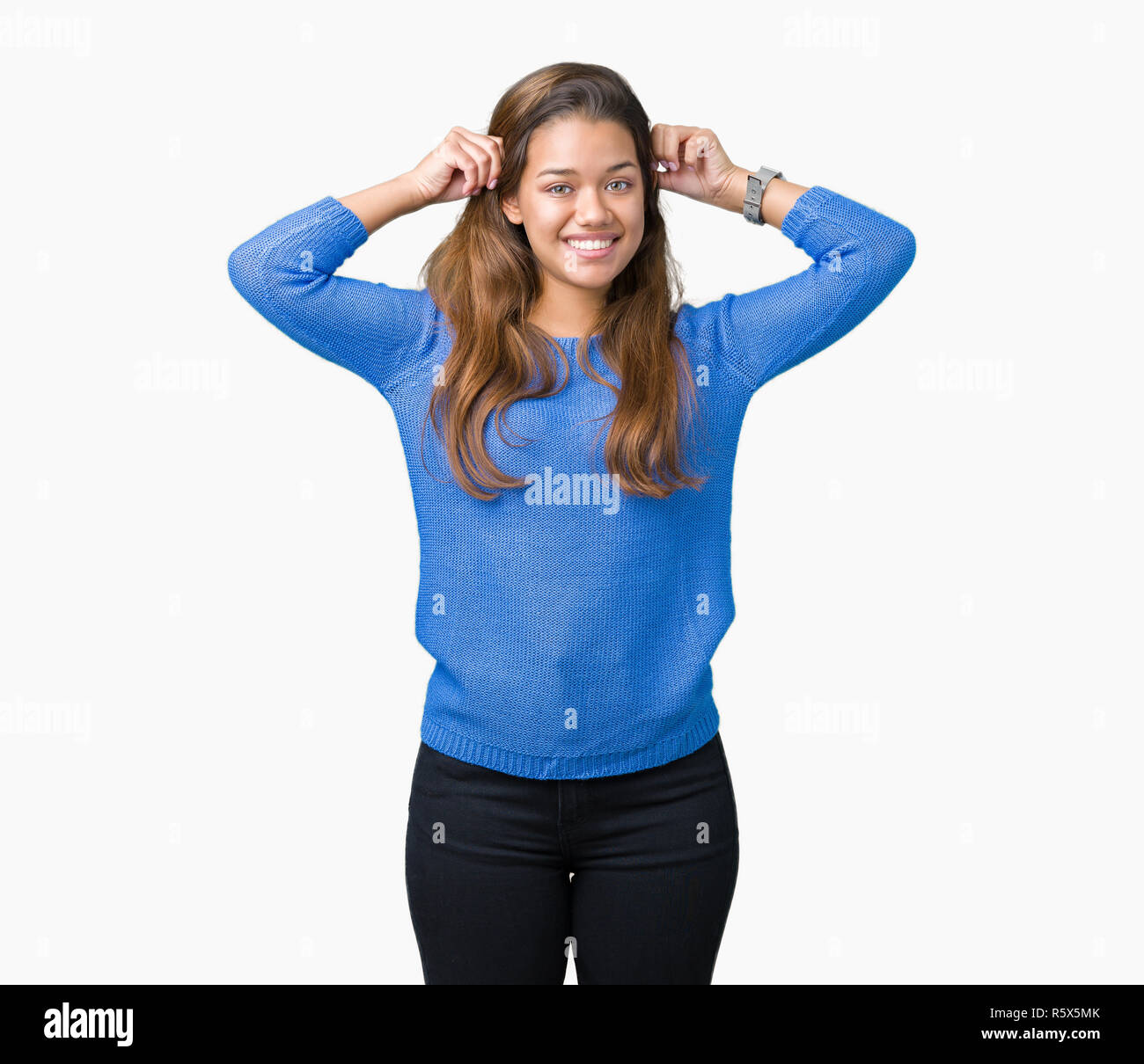 Woman pulling sweater over face hi-res stock photography and images - Alamy