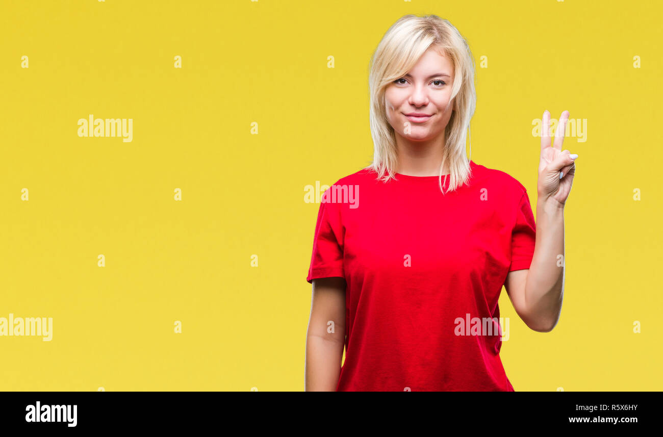 Young beautiful blonde woman wearing red t-shirt over isolated ...