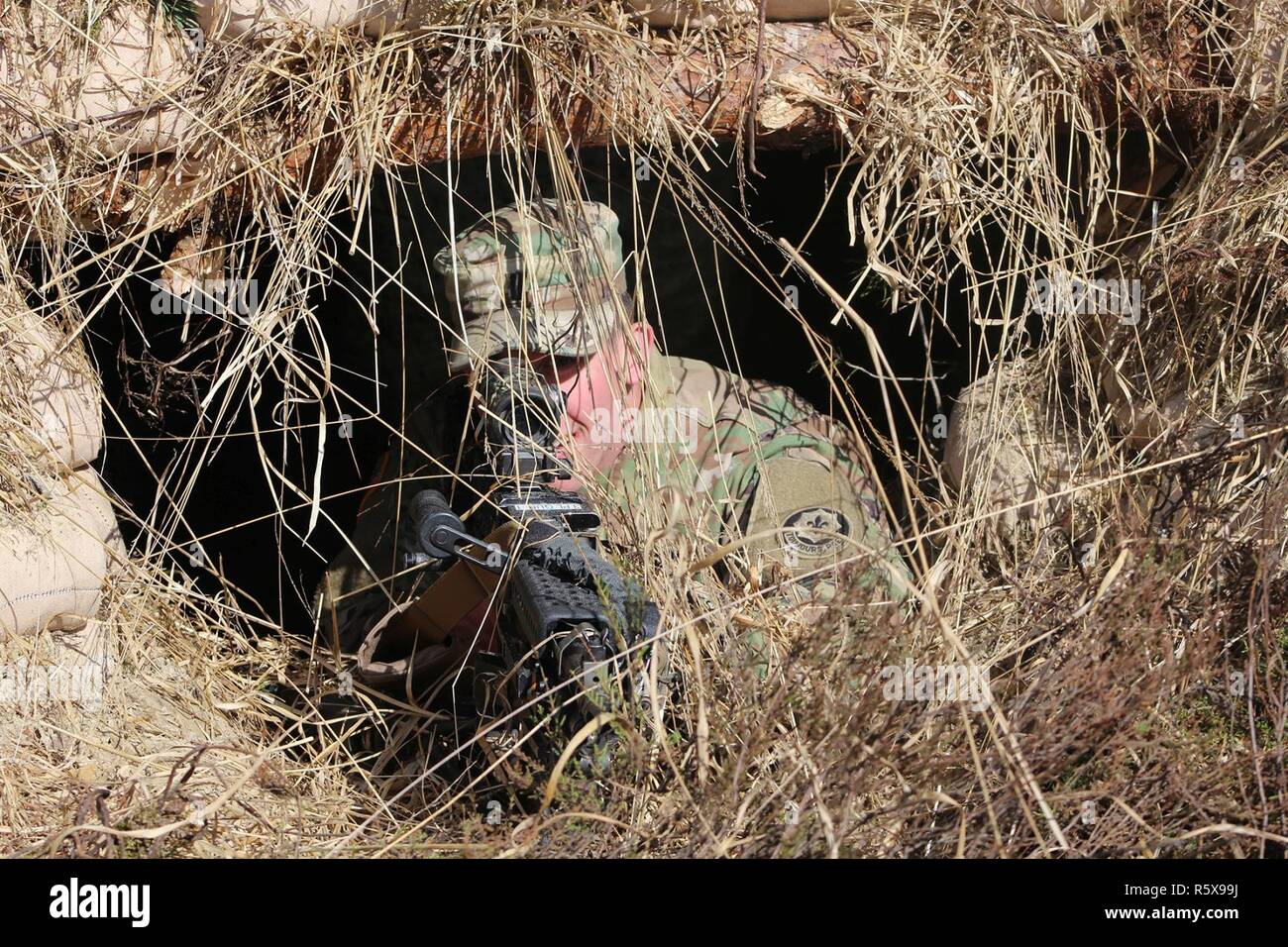 1st Lt. Matthew Medlin demonstrates proper machine gun placement in ...
