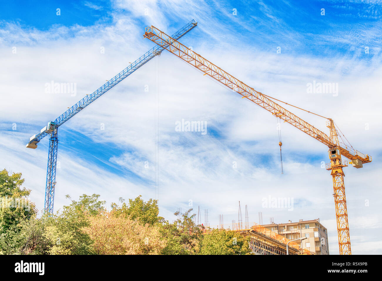 Construction crane on construction site Stock Photo - Alamy