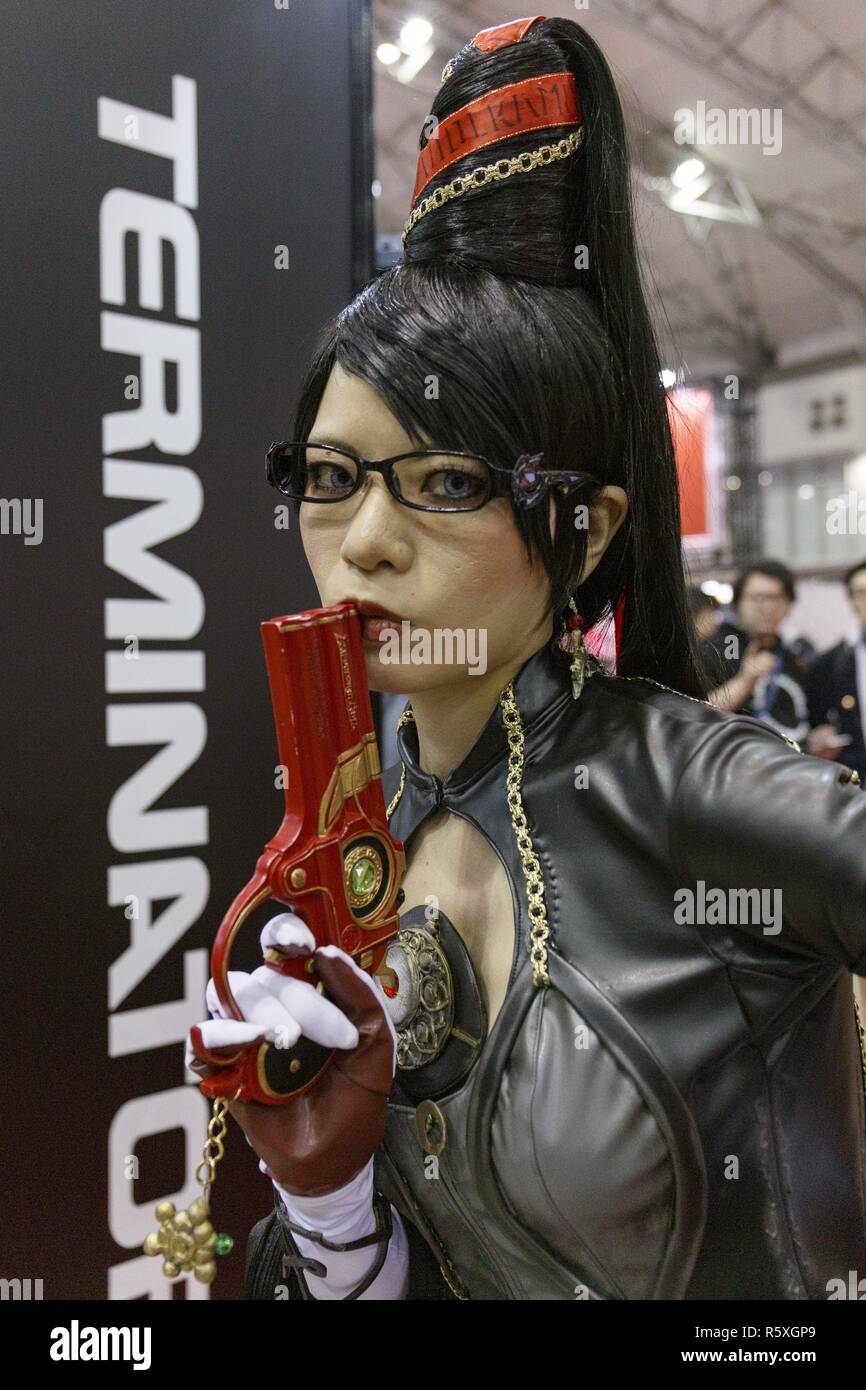 Chiba, Japan. 2nd Dec, 2018. A cosplayer poses for a photograph during ...